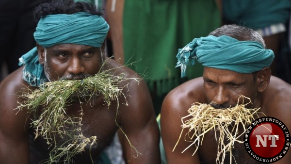 World’s most bizarre protest? Now, man in Modi mask whips TN farmers at ...