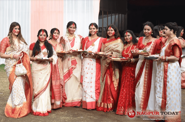Women bid Maa farewell with Sindur khela ceremony at Katol Road.